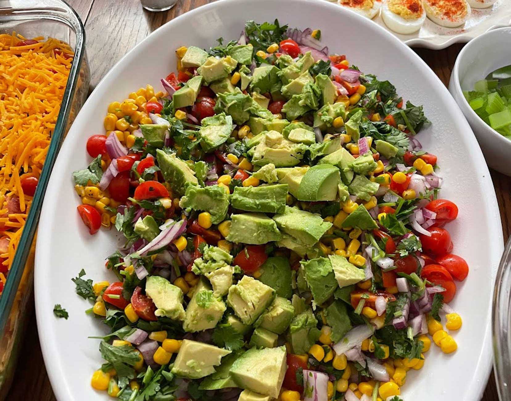 Quick and easy avocado, corn, and tomato salad - Elyssa McGregor